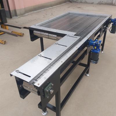 China Transporte automático de cadena plana con motor de gravedad Telescópico de rodillos en venta