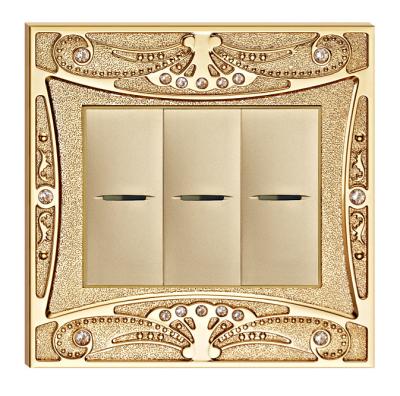 China 24K Gold Plated Finish Forged Brass Wall Switch With Pattern and Diamond for sale