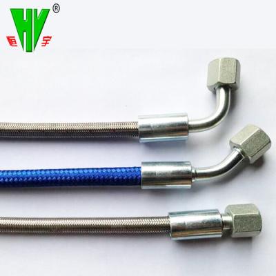 China High temperature iron corrugated hose with braiding ss304 PTFE teflon hose for sale