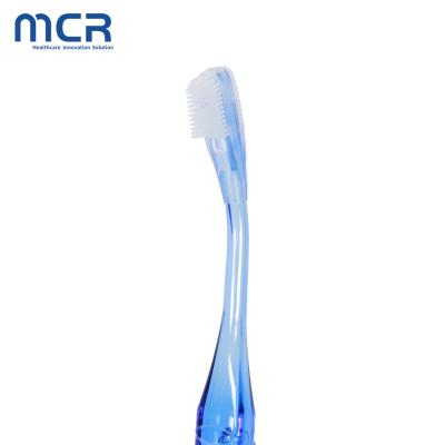 China Medical Suction Toothbrush with Silicone Bristles Suction Hole and Transparent Handle for Oral Care for sale
