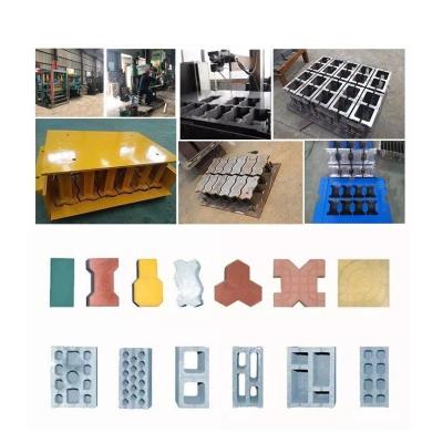 China Automatische Eco Lego bodem modder klei cement interlocking baksteen machine met hydraulisch systeem Te koop