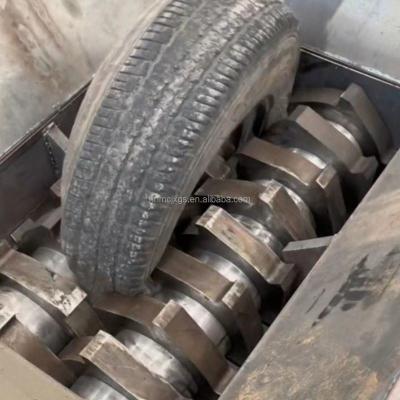 China Recycling Scrap Car Truck Tires Dual-Shaft Shredder with Rotating Mesh and Performance for sale