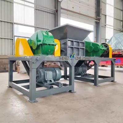 China DC53 Blades Material Triturador elétrico de eixo duplo para trituração de madeira e árvores frutíferas à venda