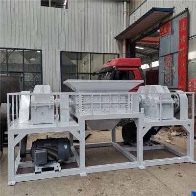 China Embalagem Peso Bruto 900.000kg Triturador de eixo duplo para reciclagem de pneus de borracha durável à venda