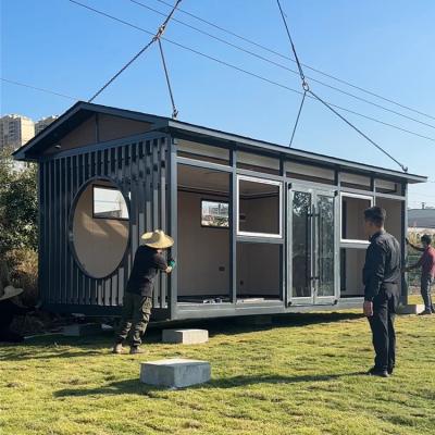 China 50 mm/75 mm painel de sanduíche casa de contenedor pré-fabricado com casa inteligente e outros adesivos à venda