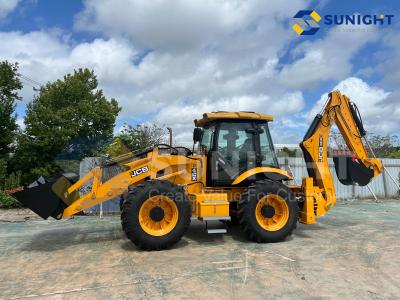 ディーゼルエンジンのJCB 4CXホイールローダー