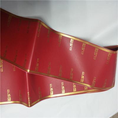 China 35gsm yellow cork cigarette filter hot stamping foil tipping paper with perforation for sale