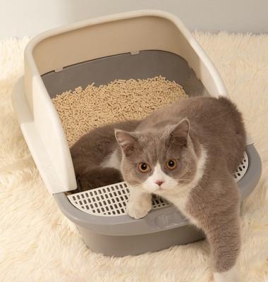 China Customized Semi Enclosed Anti Splashing Cat Sand Basin for Pet Toilet 3 Color Choices for sale