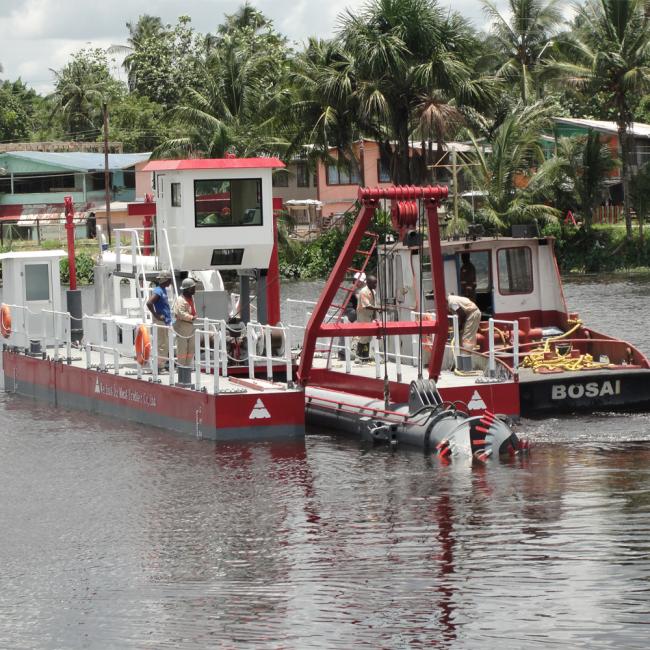 Close-up of dredger components