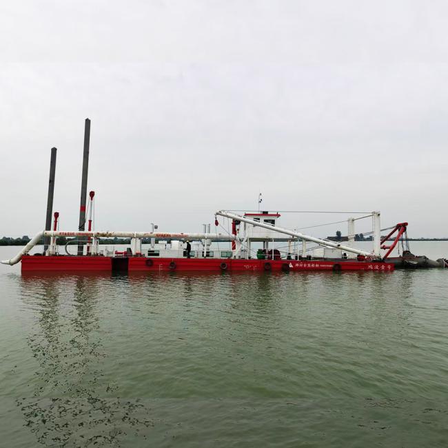 Sand Pumping Dredger in Operation