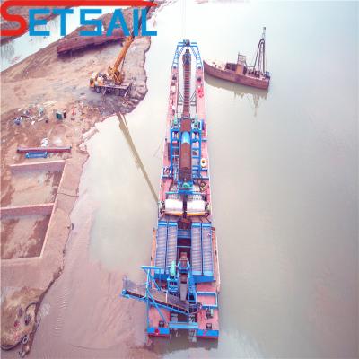 China 22kw Lifting Motor Power Made in Chain Bucket Mining Dredger met agitatie chute Te koop
