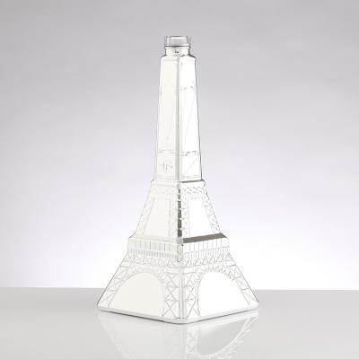 China Garrafa de vidro em forma de torre Eiffel de 500 ml com tampa de design único e vidro Super Flint à venda