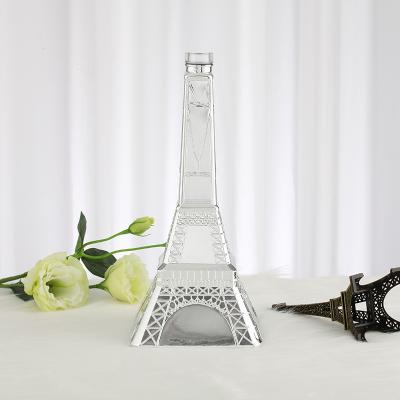 China Garrafa de vidro em forma de torre Eiffel de 500 ml com tampa de design único e vidro Super Flint à venda