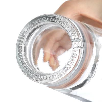 China Vidro Super Flint Redondo Vazio Vinho Liquor Whiskey Vodka Tequila Garrafa com tampa de cortiça à venda