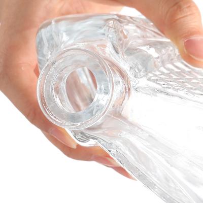 China 500ml 750ml Shaped Liquor Bottle with Cork Made of Super Flint Glass Material for sale