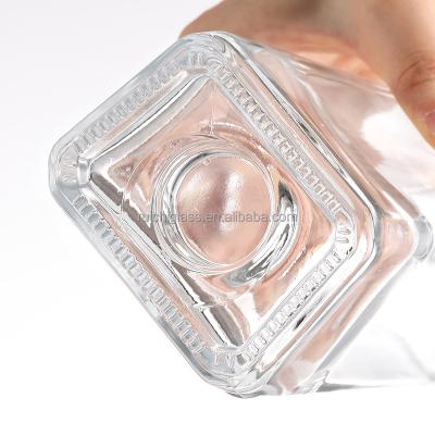China Estampagem a quente 500ml 700ml 750ml garrafa de licor em forma vazia com tampa de design personalizado à venda