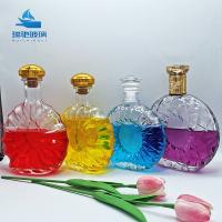 China Custom Design Bulk Empty 750ml Nordic Clear Embossed Vodka Bottle for Light Display for sale
