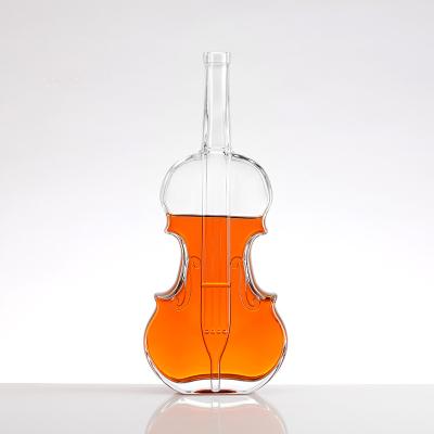 Cina Bottiglia in vetro di brandy tequila gin a forma di violino con tappo a vite di sughero e capacità di 30 ml in vendita
