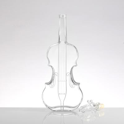Cina Bottiglia in vetro di brandy tequila gin a forma di violino con tappo a vite di sughero e capacità di 30 ml in vendita