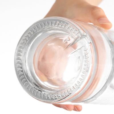 Cina Bottiglia in vetro piatto da 200 ml per vodka whisky gin tipo di sigillatura personalizzare Spedizione rapida in vendita