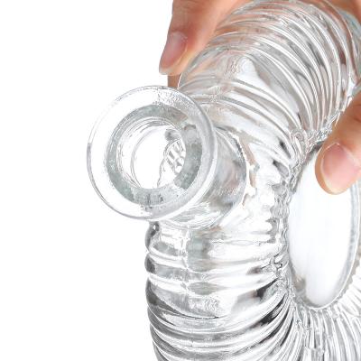 Cina 500 ml di vetro trasparente vino gin whisky tequila liquore vodka bottiglia con coperchio in vendita