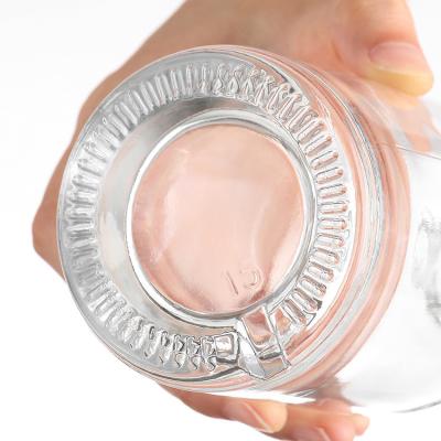 Cina Mini bicchiere di whisky rotondo trasparente di vino vodka bottiglia di whisky con tappo di sughero 100 ml in vendita