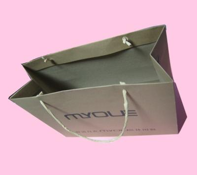 China Custom Luxury Gift Garment Paper Shopping Bags With Logo Print for sale