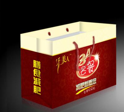 China Custom Luxury Gift Garment Paper Shopping Bags With Logo Print for sale