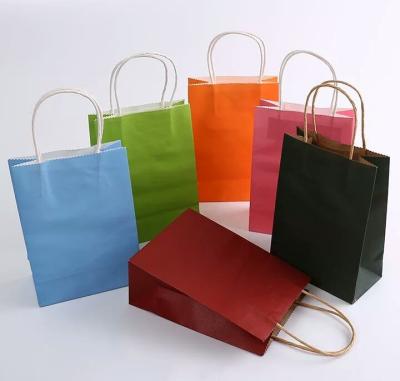 China Custom Luxury Gift Garment Paper Shopping Bags With Logo Print for sale
