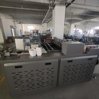 Cina Non standard carton machine # decorative works # food carton # disposable lunch box # Hot-melt adhesive process in vendita