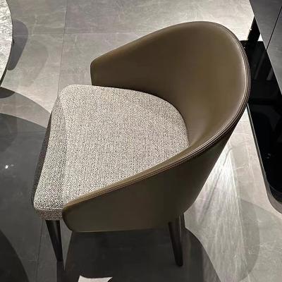 China Flexief laag rugstof Eetkamer stoelen Polstered staal basis Te koop