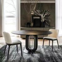 China Italian Modern Ceramic Marble Extendable Dining Table 135cm Round Steel Base 6-8 Seats for sale