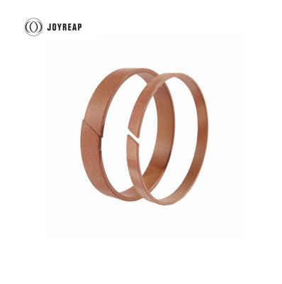 Cina OEM Fenolic Wear Ring Resina ad alto carico Anello guida marrone Tessuto rinforzato in vendita