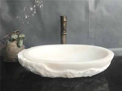 China Cloudy white marble bathroom vessel sinks natural stone wash basin oval wash bowl for sale