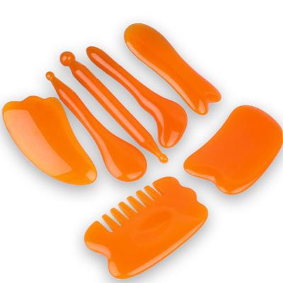 China Herramienta de masaje duradera de cera de abeja Guasha para la terapia con tablas de raspado de resina para cara y cuello en venta