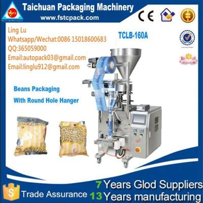 China low cost Fully automatic white pellet sugar bag packing machine,3 sides sealing bag Fully automatic white pell for sale