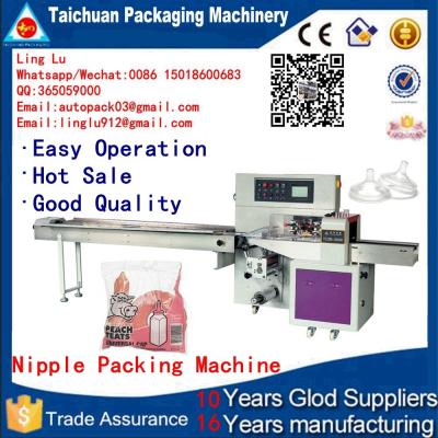 China Automatic Feeding System nipple Packing Machine for sale