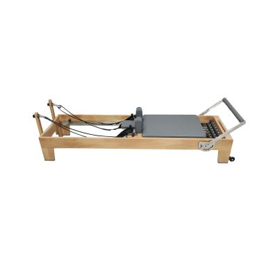 China Commercial Grade Beech Wood Pilates Reformer U+PL020B with Adjustable Resistance System for sale