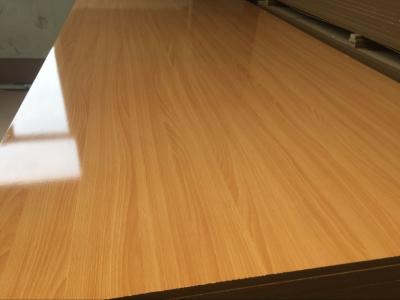 China high gloss wooden grain  4x8 melamine laminated mdf board.MDF for furniture,door skin MDF,flooring MDF.12mm 15mm 18mm for sale