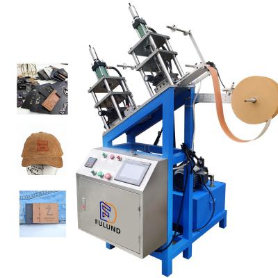 China As etiquetas do couro do plutônio das calças de brim máquina a máquina de couro automática do tipo do plutônio for sale