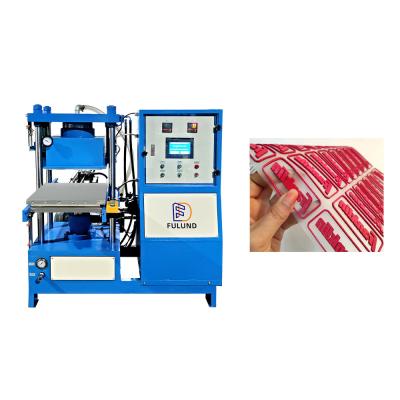 Cina FuLund silicone hot press double head hot pressing plate vulcanizing machine silicone product making machine in vendita