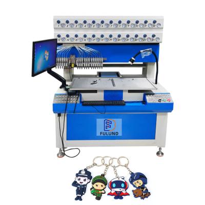 Cina Drop Molding Trademark Liquid Pvc Rubber Patch Making Machine With Manufacturer Price in vendita