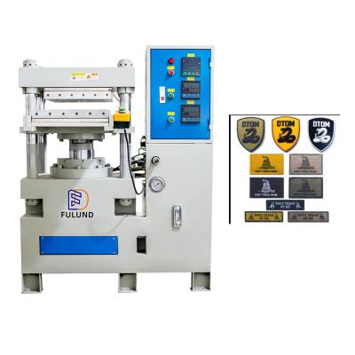 Cina Fulund since1999 manufacturer vacuum drying machine vacuum vulcanizing making machine 3d silicone logo making machine in vendita