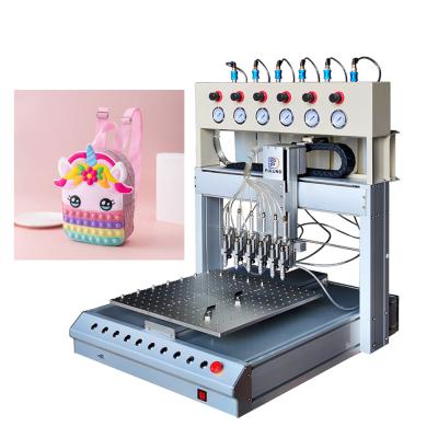 Cina 6 colori che dispensano la macchina di gomma della toppa del silicone del distintivo per la catena chiave del PVC 3d in vendita