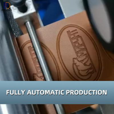 Cina Macchinario di goffratura del trasferimento di calore dello SpA della macchina dell'unità di elaborazione dell'etichetta automatica del cuoio in vendita