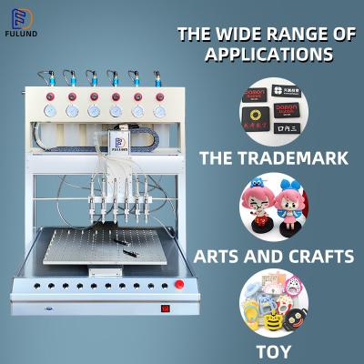 China 6 Colors Dispensing Rubber Badge Silicone Patch Machine For 3d Pvc Keychain for sale