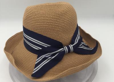 China Summer Beach Hats Foldable Brim Solid Caps Bowknot Lady Straw Sun Hat for sale