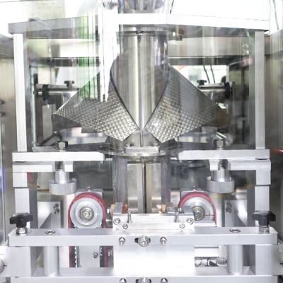 Cina Pesatrice e riempitrice combinata micro granulare 10/14 teste in vendita