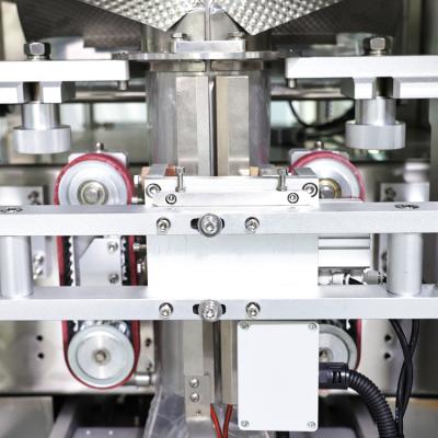 Cina Pesatrice e riempitrice combinata micro granulare 10/14 teste in vendita