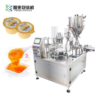 China Double Head Chili Sauce Soy Sauce Filling Sealing Machine with Piston Pump for sale